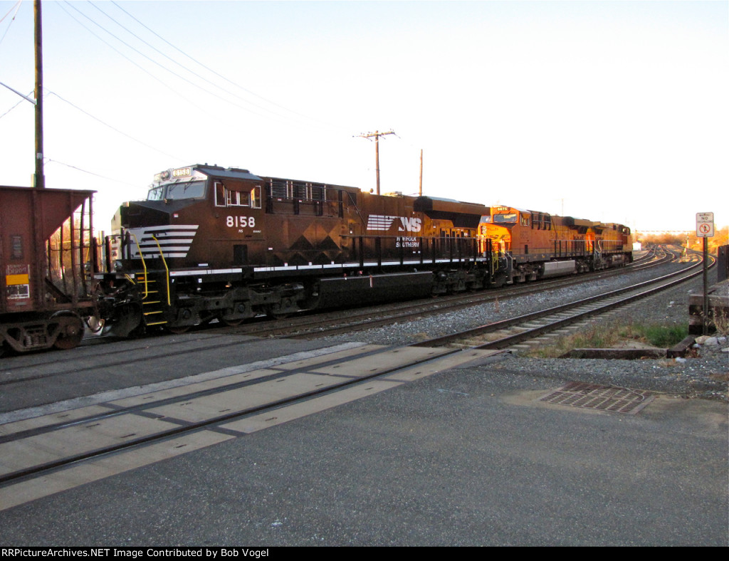 NS 8158; BNSF 6675 and 4015